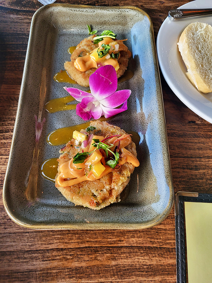 These crab cakes aren't just appetizers, they're edible art &ndash; complete with mango salsa and an orchid garnish that's almost too pretty to eat. Almost.