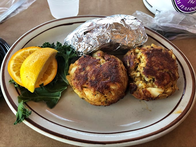 Golden-brown perfection on a plate. These crab cakes are what food dreams are made of&mdash;mostly crab, minimal filler, and a seasoning blend that whispers rather than shouts.