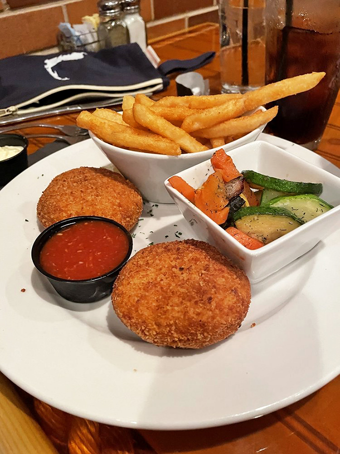 Golden-crusted crab cakes that could make a mermaid weep &ndash; minimal filler, maximum flavor, and a reminder of why we invented cooking.