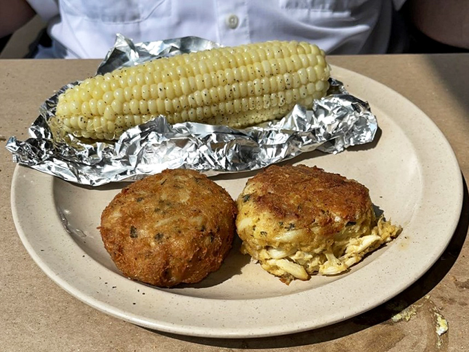 Golden-brown perfection meets sweet corn on the cob&mdash;these crab cakes contain so little filler, they practically need their own fishing license.