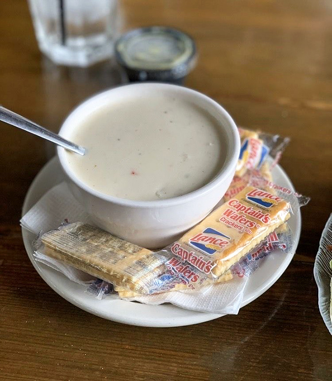 The legendary crab stew arrives with crackers for dunking &ndash; creamy, rich, and packed with sweet crab meat that makes conversation stop mid-sentence.