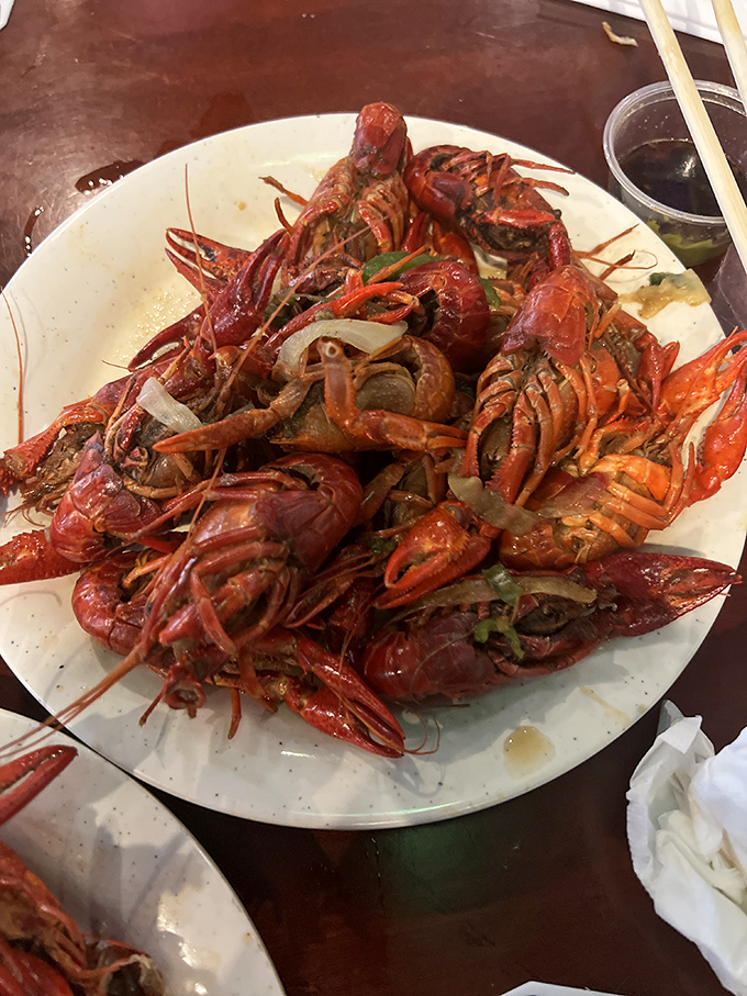 Fresh crawfish piled high like little red treasures, ready to transport you straight to Louisiana bayou bliss.