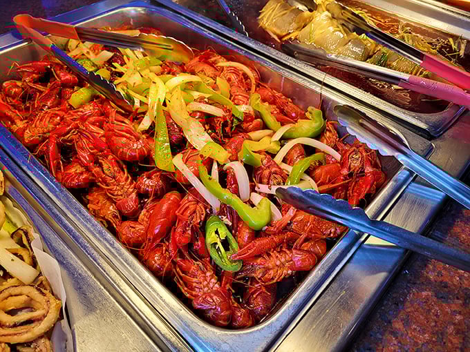 Crayfish so red they look like they're blushing from all the attention. That pile of crustacean goodness with peppers and onions is calling your name.