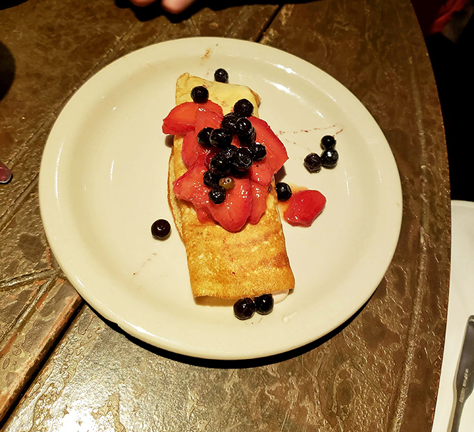 This delicate crepe with fresh strawberries and blueberries proves that Italians understand dessert isn't just a course&mdash;it's a love language.