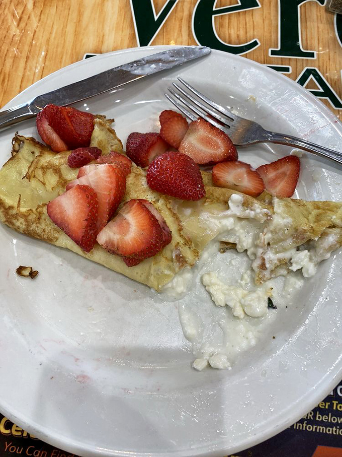 Behold the star attraction: a strawberry crepe that makes French cuisine accessible without a passport. Those berries aren't just toppings&mdash;they're the main characters.