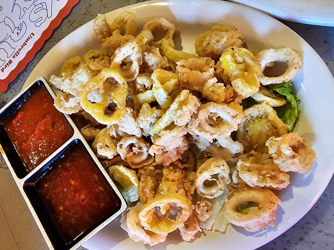 The holy grail of calamari&mdash;golden, crispy rings that shatter between your teeth without a hint of rubber tire chewiness.