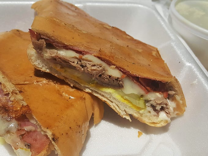 This isn't just a Cuban sandwich; it's a cross-cultural masterpiece. Layers of flavor pressed between bread that's achieved the perfect crunch-to-softness ratio.