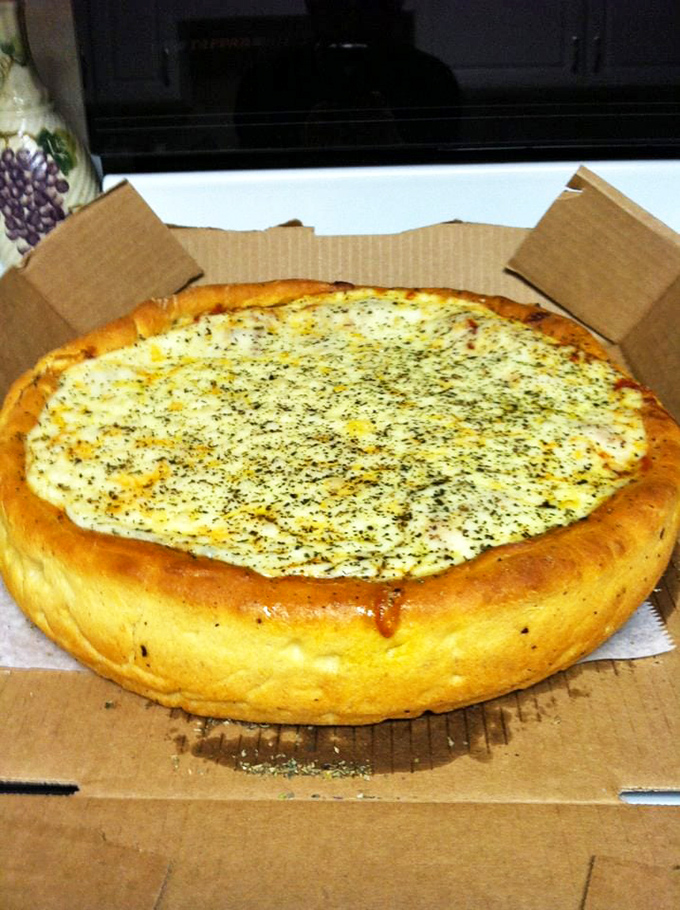 This deep-dish masterpiece sports a golden crown of crust that's halfway between bread and pastry &ndash; architecture you can eat.