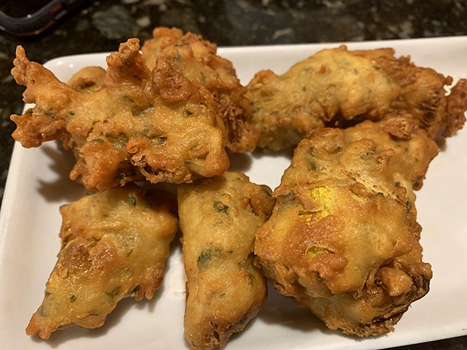 Golden, crispy, and ridiculously addictive—these deep-fried artichoke hearts are why you made the drive here.