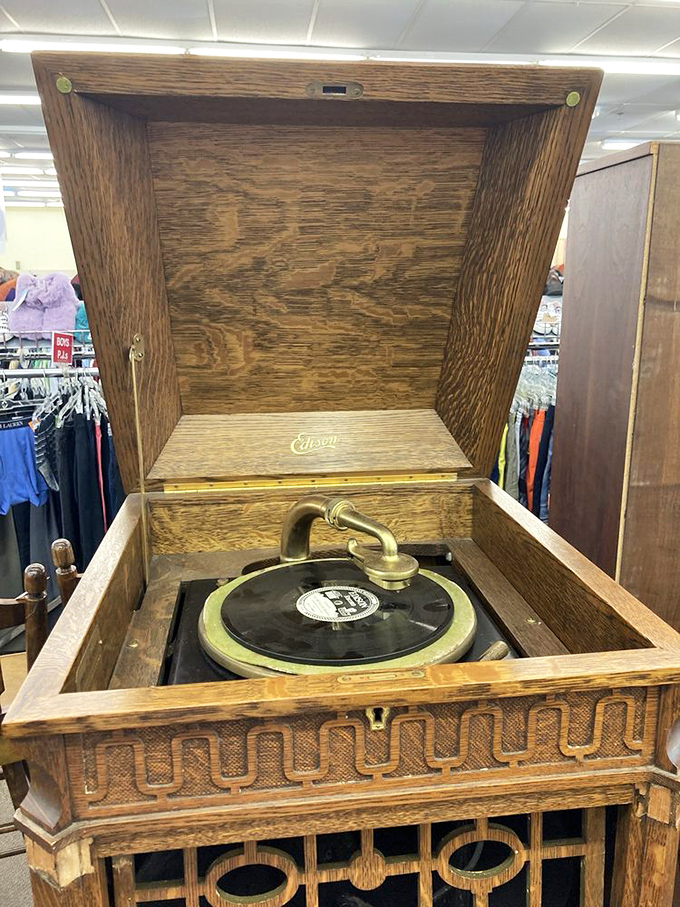 This isn't just a vintage phonograph; it's a time machine disguised as furniture, ready to transport you to Sunday afternoons of yesteryear.