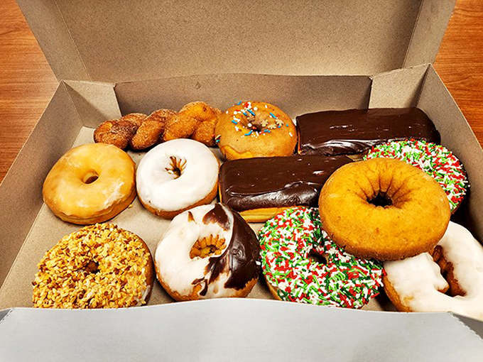 Donut nirvana in cardboard form. The sprinkled one is practically winking at you, while the chocolate-dipped is playing hard to get.