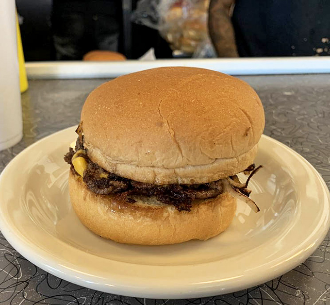 This isn't just a cheeseburger&mdash;it's edible nostalgia, a perfectly proportioned reminder of when food was honest and a meal didn't require a dictionary.