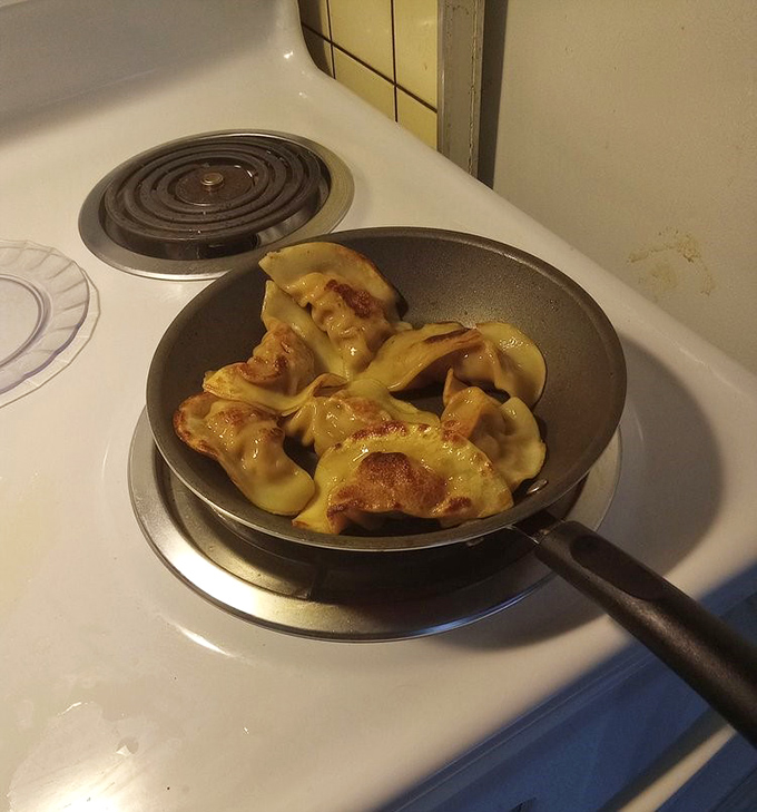 These pan-fried dumplings aren't just cooked, they're transformed &ndash; crispy bottoms giving way to tender wrappers and savory filling that would make any grandmother proud.