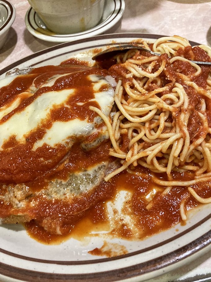 Behold the star of our show: eggplant parmigiana that achieves the holy trinity of Italian-American perfection&mdash;tender eggplant, robust sauce, and cheese that stretches for days.