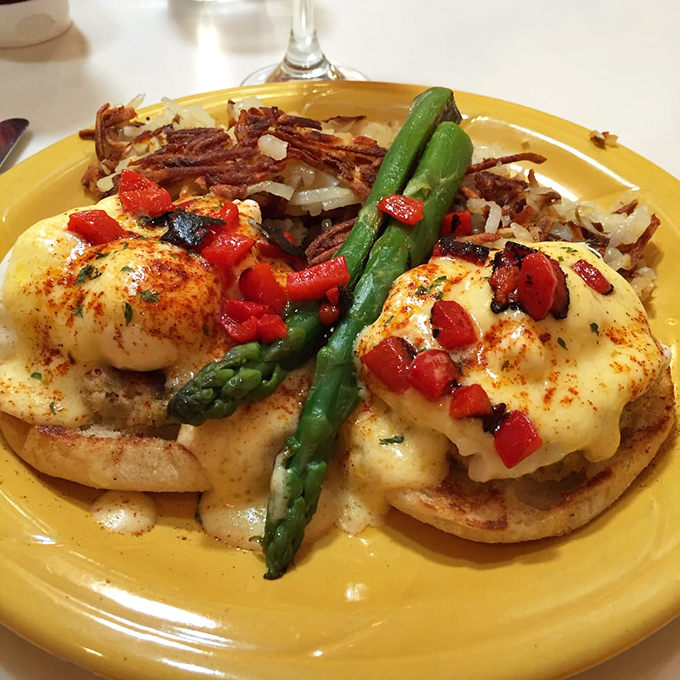 Behold the Benedict that launched a thousand breakfast dreams. Those perfectly poached eggs are about to perform their runny yolk magic.
