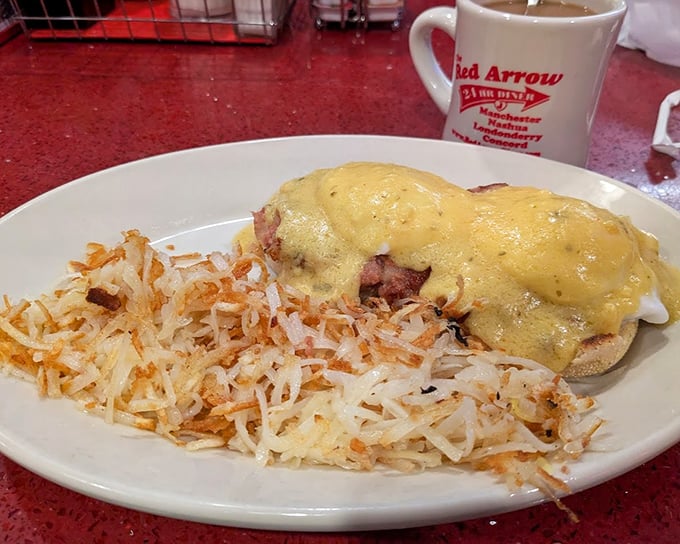 Eggs Benedict that would make a French chef weep with joy, paired with hash browns that crackle with each heavenly bite.