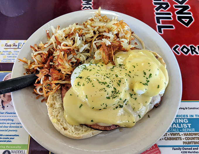 Behold the star attraction: eggs Benedict with perfectly poached eggs, draped in hollandaise that would make a French chef weep.