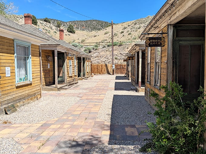 Ely Renaissance Village recreates frontier life with weathered buildings that understand authenticity better than any theme park ever could.
