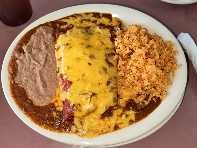 Behold the enchilada plate that makes grown Texans weep tears of pure joy and satisfaction.
