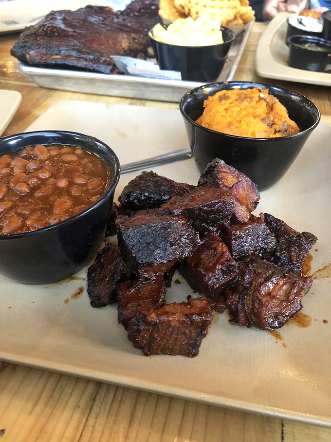 Burnt ends that would make Kansas City weep with joy, flanked by baked beans and cornbread &ndash; the holy trinity of barbecue satisfaction.