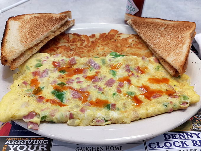 The legendary Farmers Omelet in all its glory&mdash;a perfect marriage of fluffy eggs, colorful vegetables, and melty cheese. Breakfast architecture at its finest.