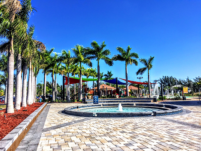 This playground proves Florida knows shade is nature's sunscreen. Those oak trees have been providing SPF 50 longer than Coppertone.