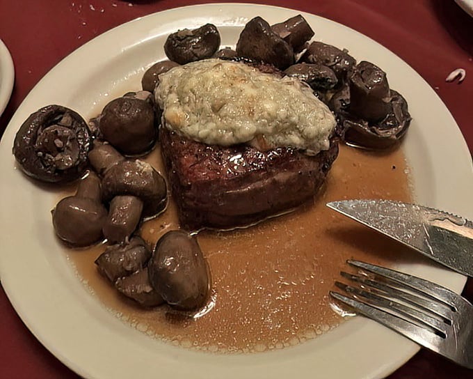 The star of the show: a filet mignon topped with gorgonzola butter and mushrooms. Meat so tender you could cut it with a stern glance.