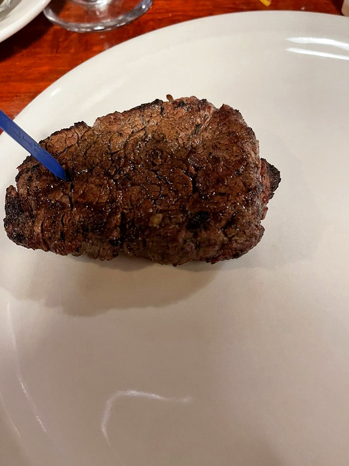 This isn't just a steak&mdash;it's a masterpiece of meat. The perfect crust seals in juices that would make even the most composed carnivore weak at the knees.