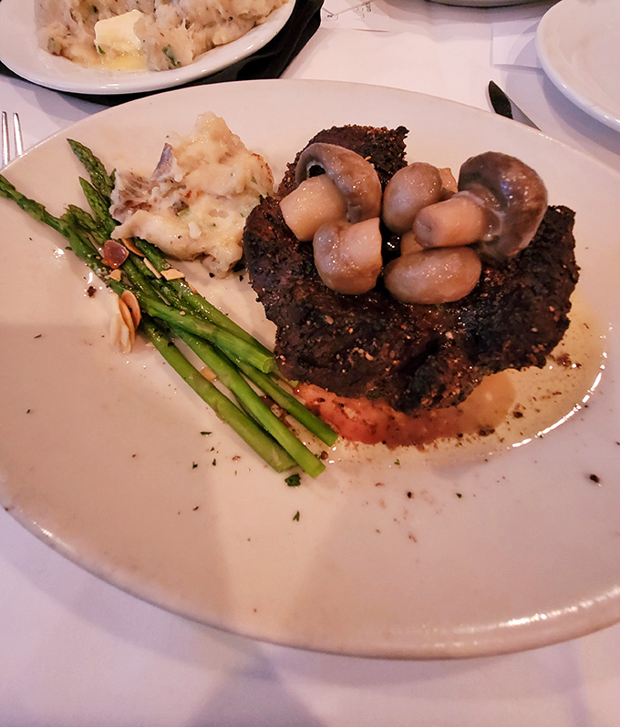 This isn't just steak&mdash;it's a masterpiece with mushrooms. The kind of dish that makes you consider selling your vacation timeshare for just one more bite.