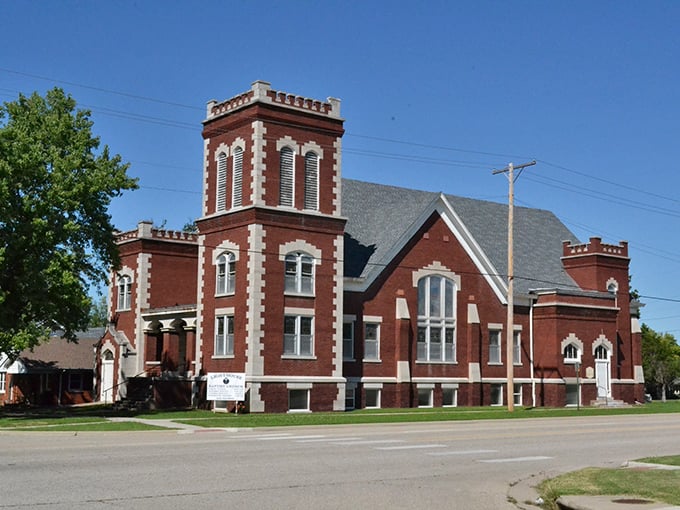 The First Congregational Church's striking red brick towers have witnessed generations of Independence residents gathering for both worship and community.
