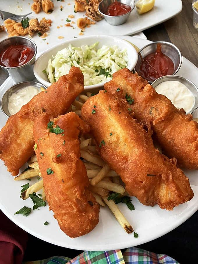 Golden, crispy, perfect&mdash;these fish and chips aren't just food, they're edible sunshine. The accompanying sauces are like backup singers who could be stars themselves.