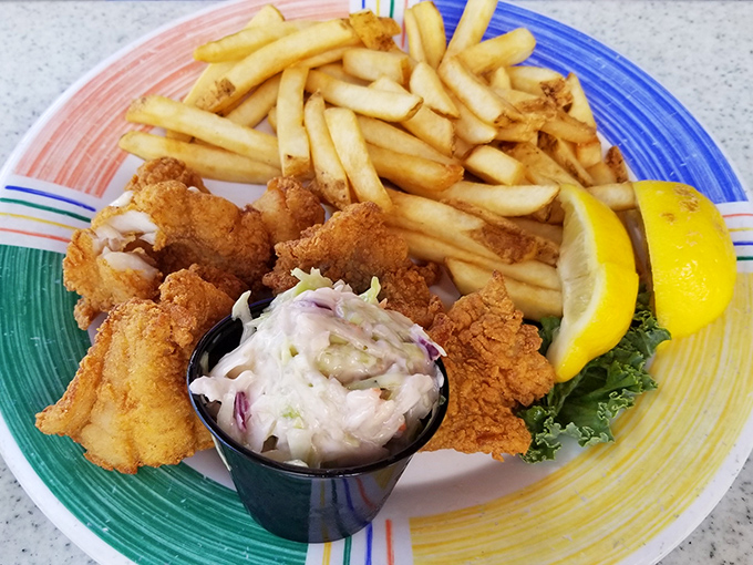 Behold the golden glory &ndash; fish and chips that make British pubs weep with envy, served with Florida sunshine.