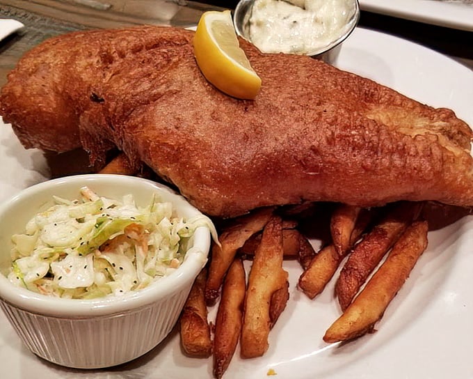 Golden-battered fish that shatters like glass, with fries that could make a Brit homesick. The coleslaw provides the perfect cool counterpoint.
