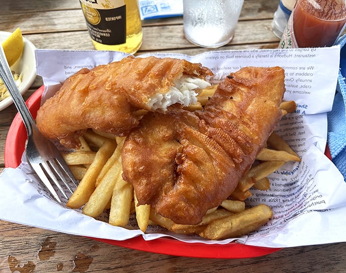 Golden-battered fish that shatters with a satisfying crunch, revealing pearly white flesh that practically high-fives your taste buds. 