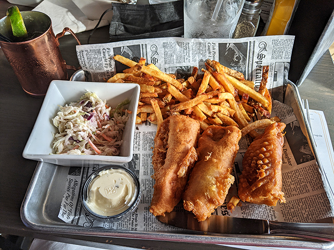 Golden, crispy perfection served on newsprint&mdash;because some traditions are worth honoring, especially when they taste this good.