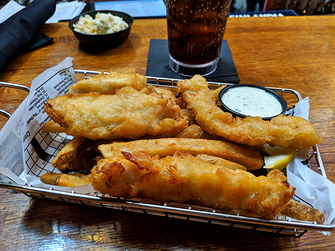 Golden, crispy perfection&mdash;Cooper's legendary fish and chips arrive in a wire basket like treasure from the deep.