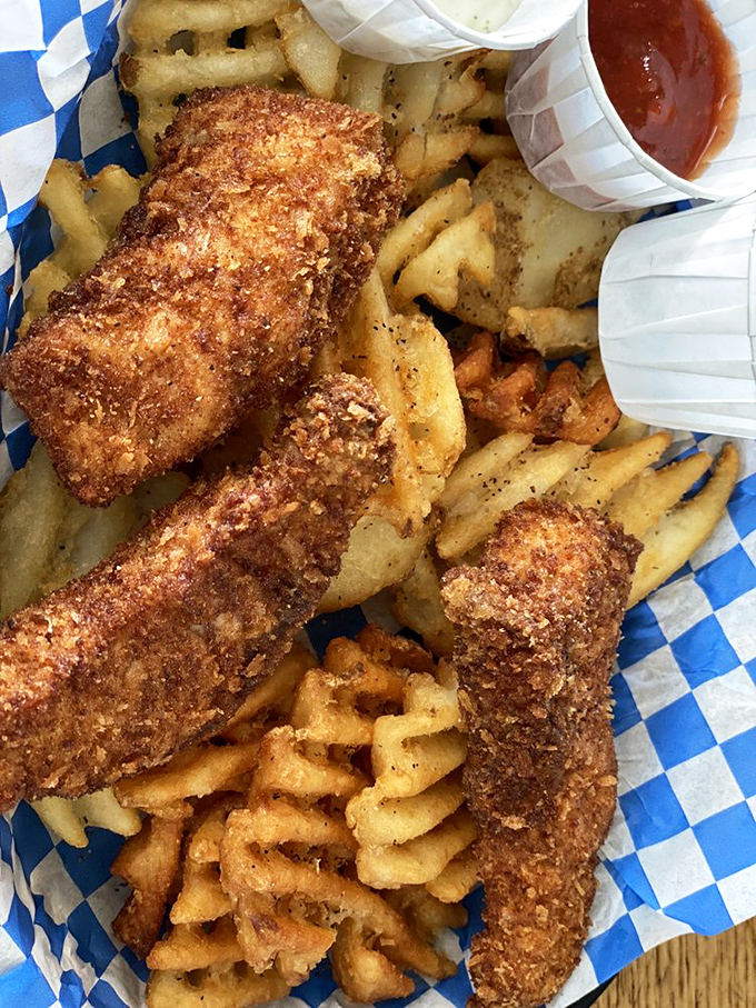 Golden-brown perfection! These fish and chips aren't just fried&mdash;they're transformed into crispy vessels of seafood bliss.