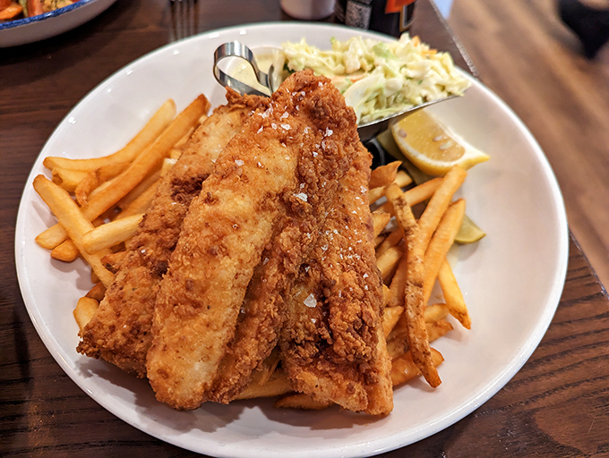 Golden-battered fish and chips that would make a Brit homesick. The perfect crunch gives way to flaky white fish that practically melts.