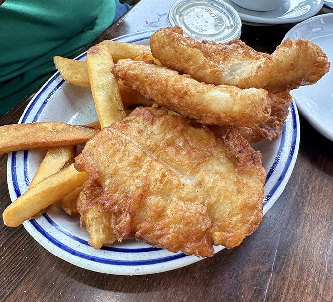 Golden, crispy perfection that makes you understand why people drive for hours. This isn't just fish and chips&mdash;it's edible coastal poetry.