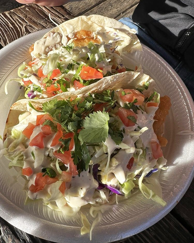 These fish tacos aren't just food&mdash;they're an edible love letter to the ocean, dressed in fresh veggies and housed in soft tortillas.