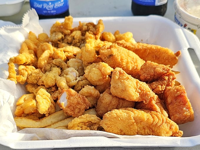 Golden-fried perfection that would make Neptune himself weep with joy. This Fisherman's Platter is what seafood dreams are made of.