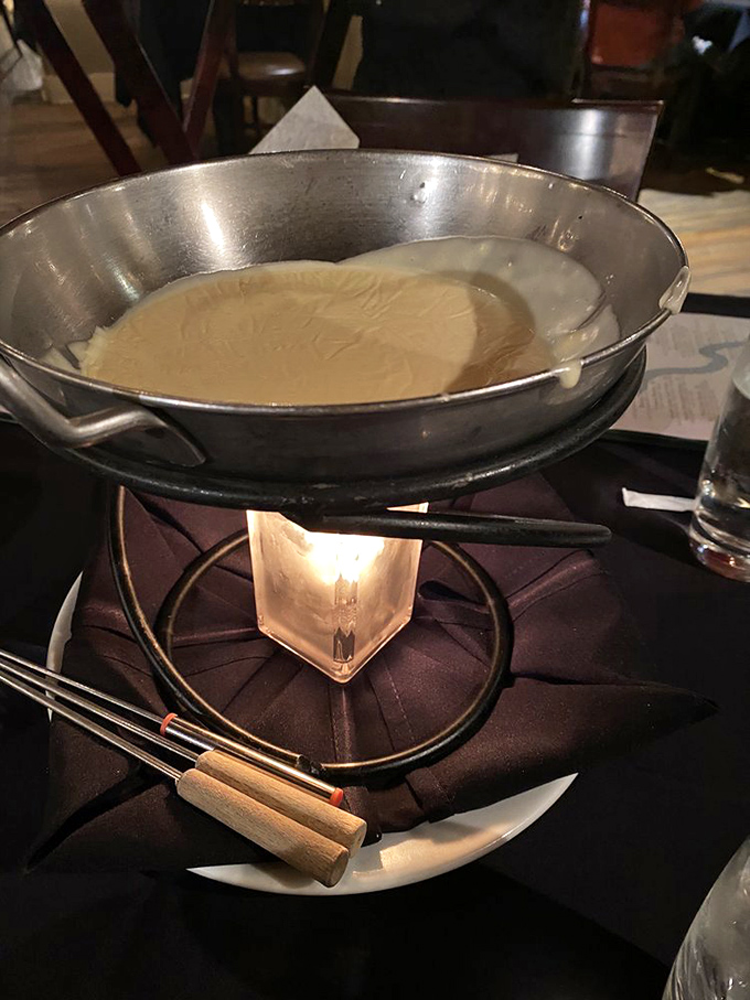 Cheese fondue that bubbles with possibility. Dipping into this molten masterpiece feels like discovering gold in the Land of Enchantment.