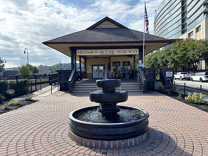 The fountain welcomes visitors with a gentle splash, nature's way of saying "slow down, you're on train time now."