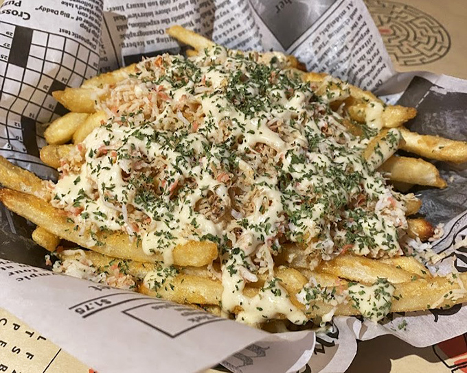 Not your average fries! These golden beauties come dressed for success with generous helpings of crab meat and herbs. 