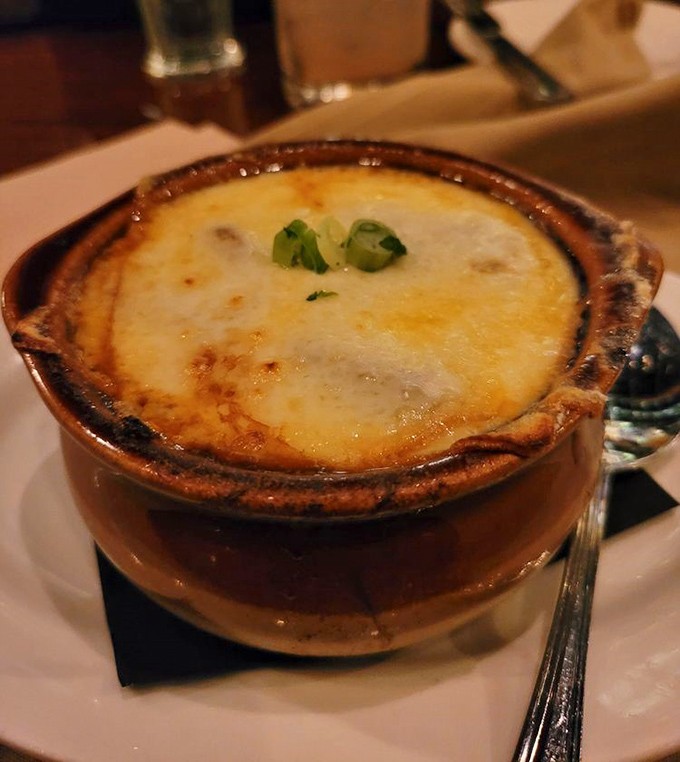 Behold the French onion soup in all its glory&mdash;a bubbling cauldron of cheese-capped perfection that would make Julia Child weep with joy.