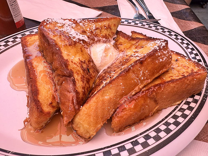 This isn't just French toast – it's a golden-brown masterpiece that makes you question why you ever settled for lesser breakfast experiences.