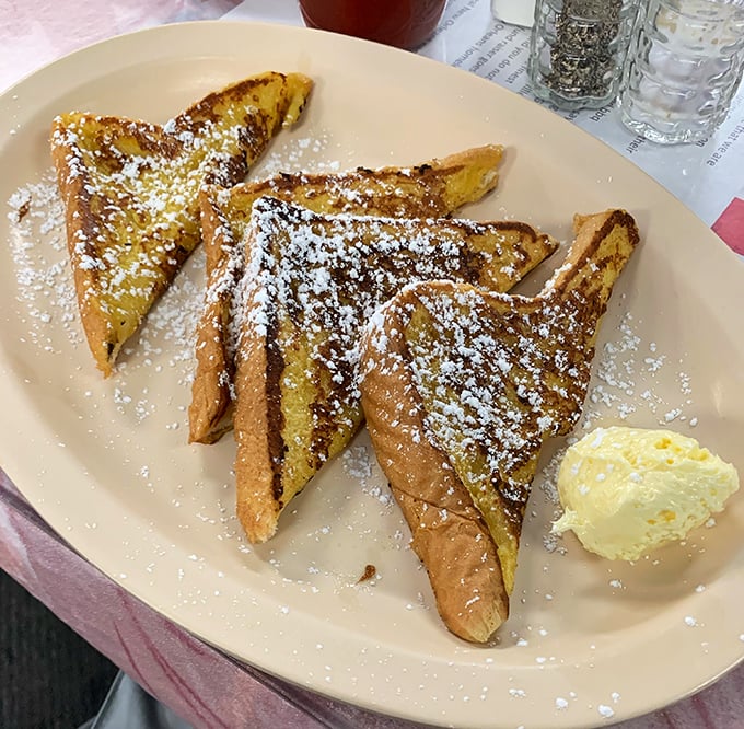 French toast that could make Julia Child weep tears of powdered-sugar joy.