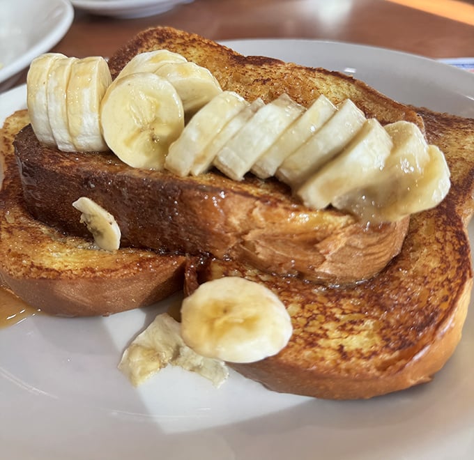 Behold the banana French toast in all its golden glory! Those perfectly caramelized slices could make even Elvis jealous.