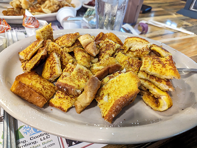 French toast that's had a proper education &ndash; golden, crispy edges giving way to a custardy center that makes mornings worthwhile.