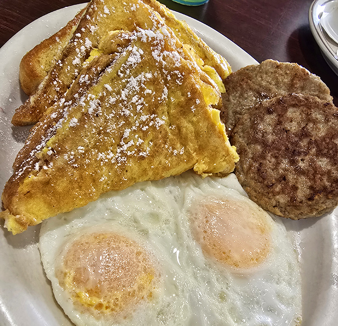 Golden French toast dusted with powdered sugar proves some mornings are worth waking up early for. 